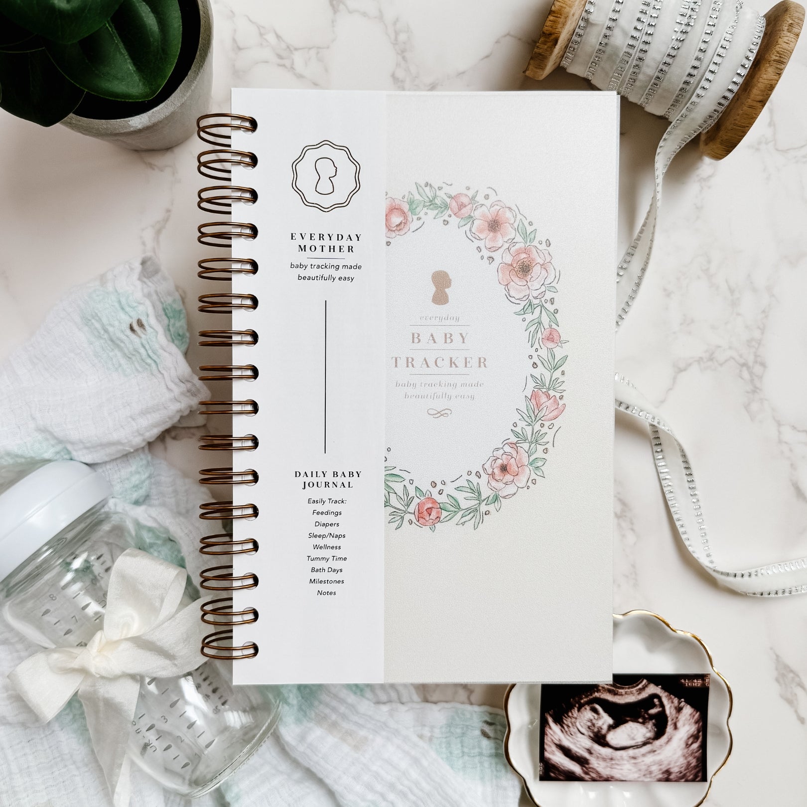 Newborn Baby Log Book by The Everyday Mother